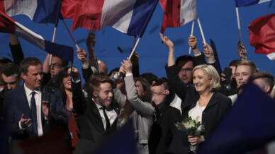 Le Pen uses May Day rally to attack ‘Hollande clone’ Macron