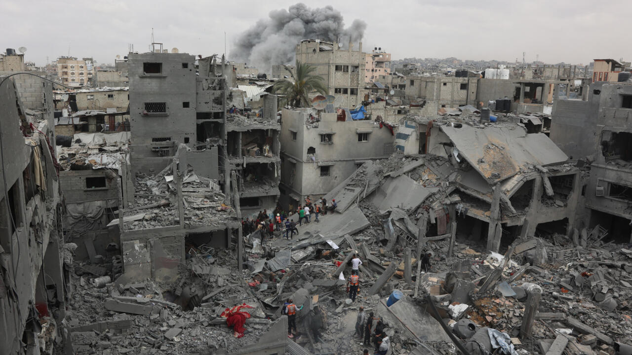 Israeli strike on Gaza residential block kills at least 23, rescuers ...