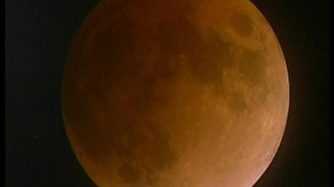 Moon turns red for total eclipse
