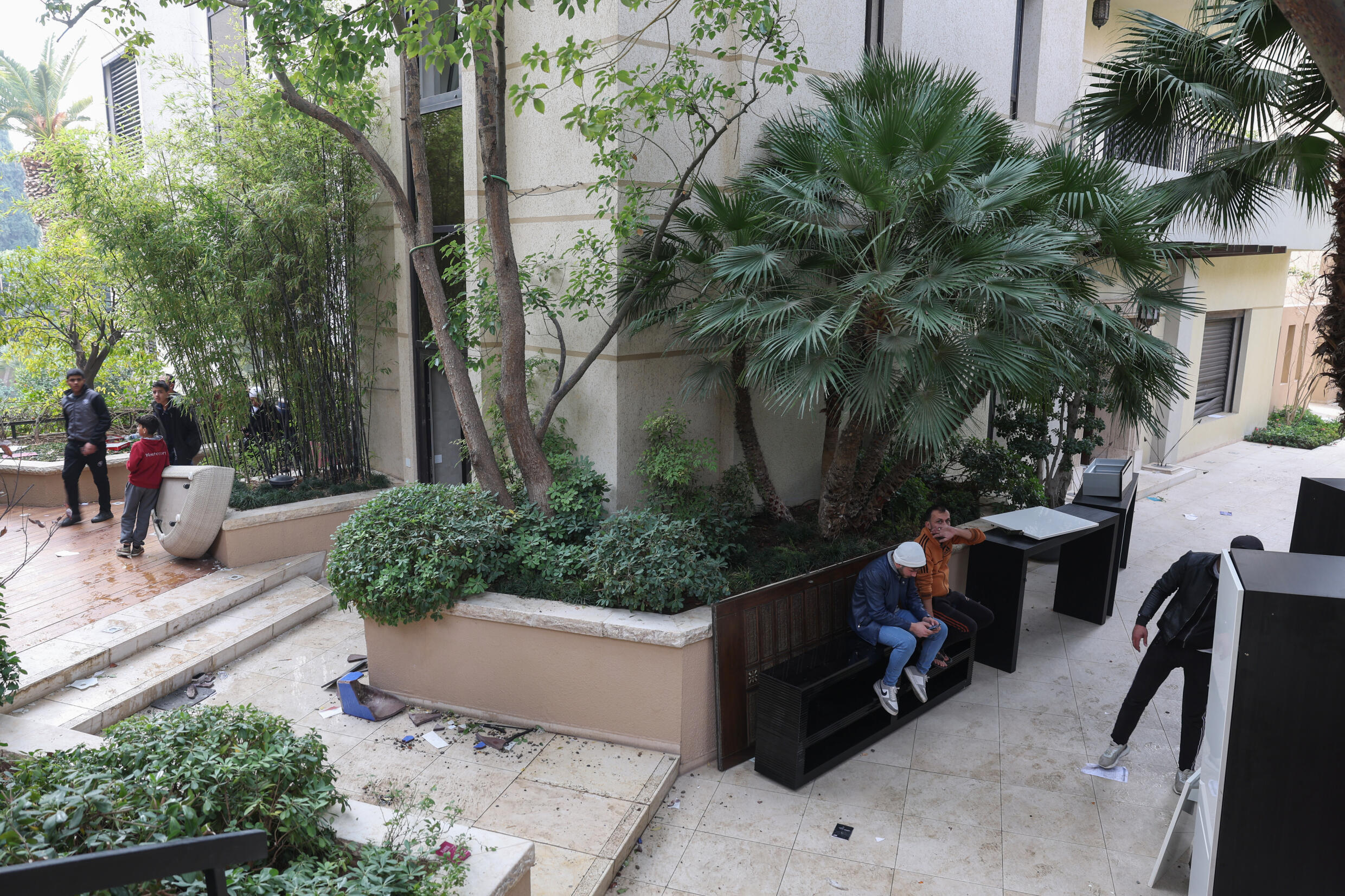 Syrians explore ousted Assad's Damascus home