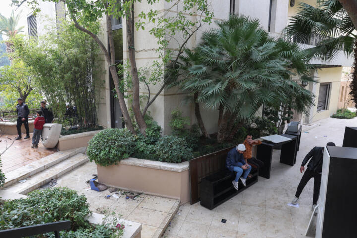 Syrians explore ousted Assad's Damascus home