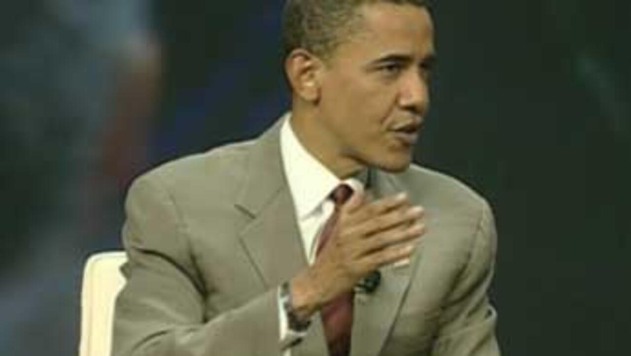 Back home, Obama defends his world tour