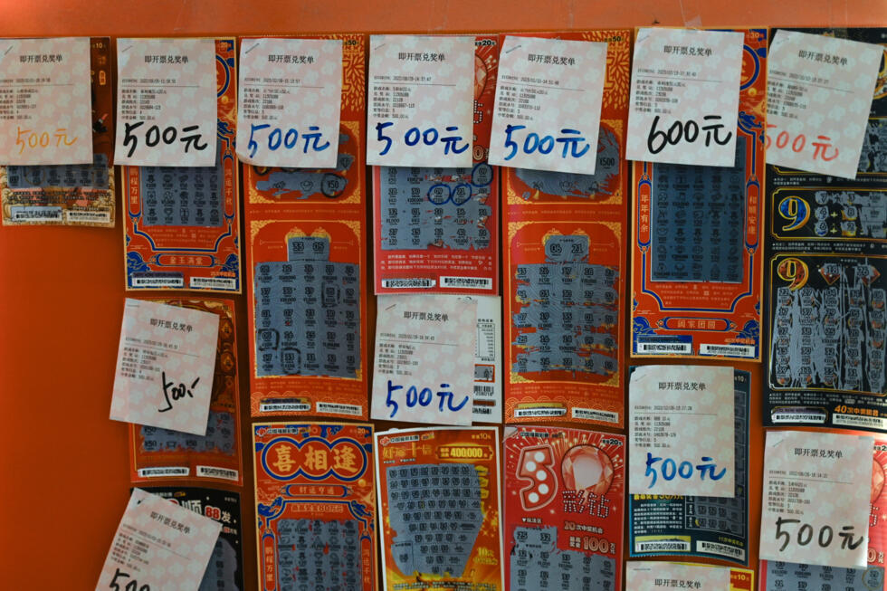 Young Chinese scratch an economic itch with lottery cards