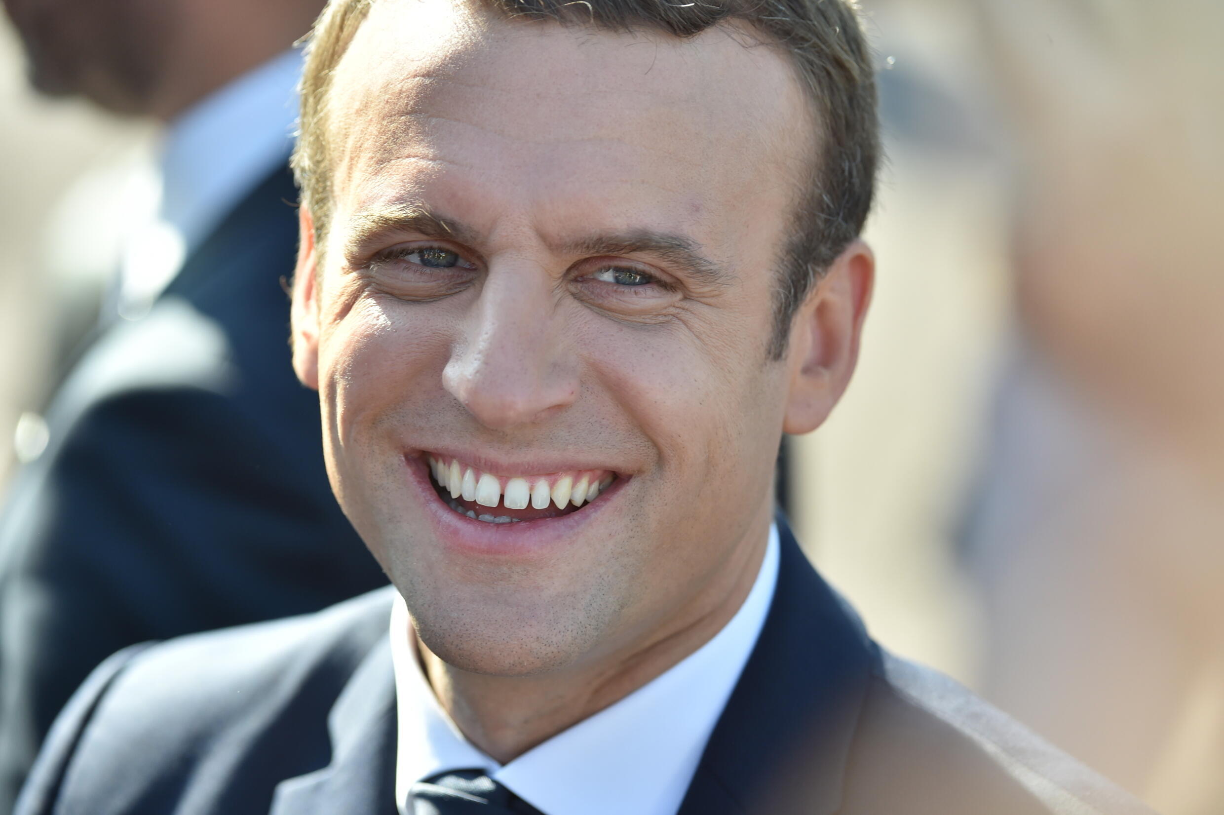 Macron seeks new term in tight French vote