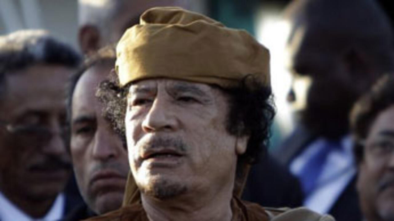 Defiant Gaddafi describes calls to leave as 'a laugh'