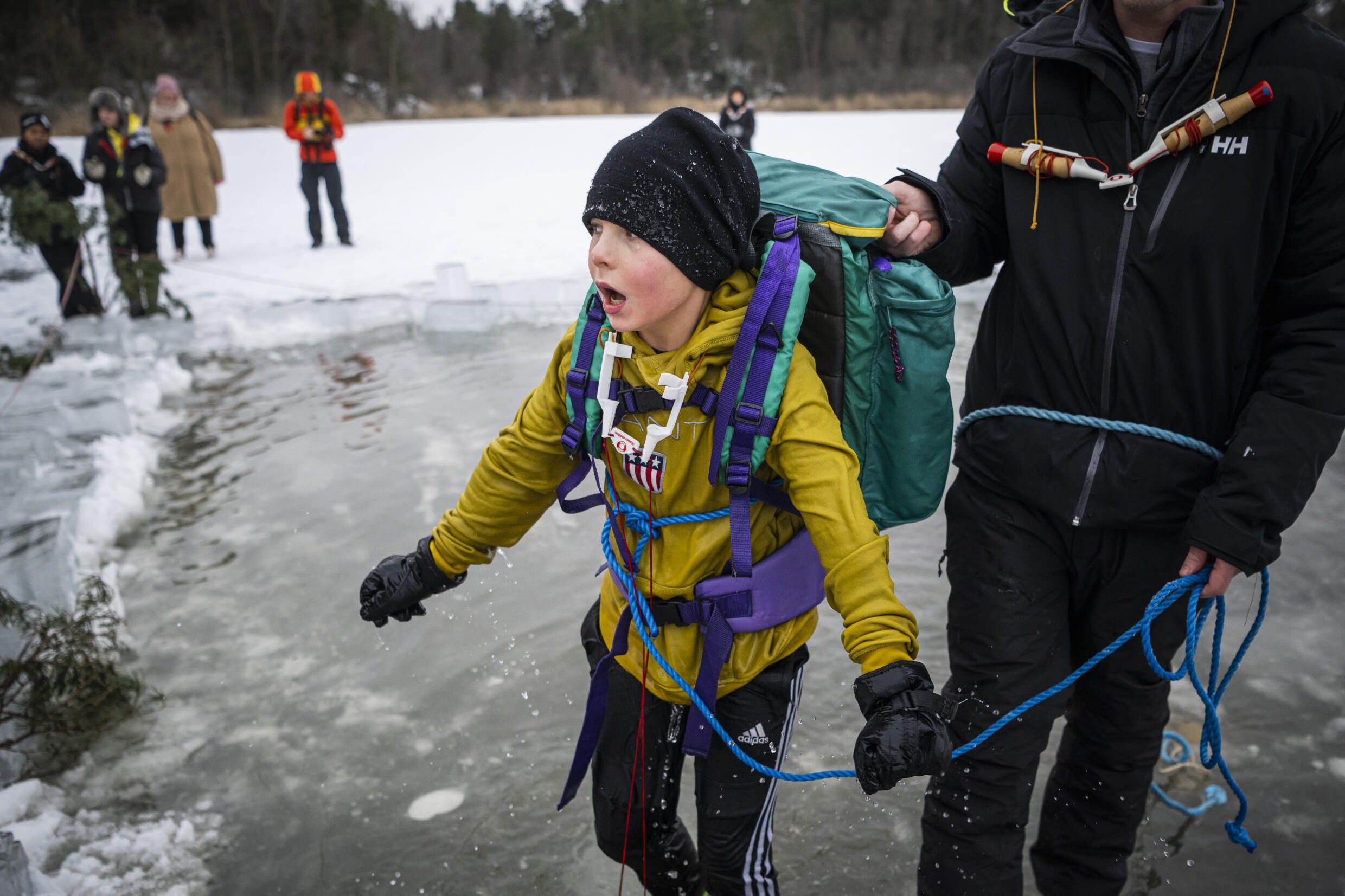 Swedish kids take the plunge in icy lake survival lessons