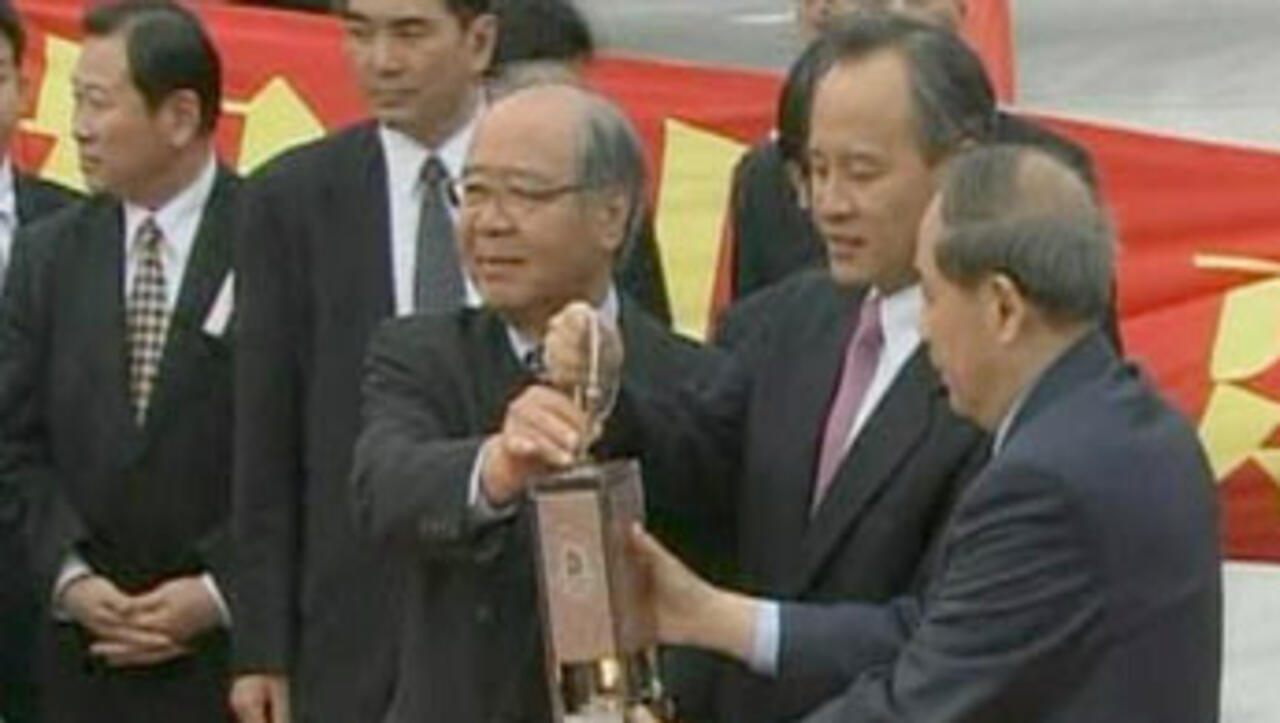 Security tense as torch touches down in Japan - France 24