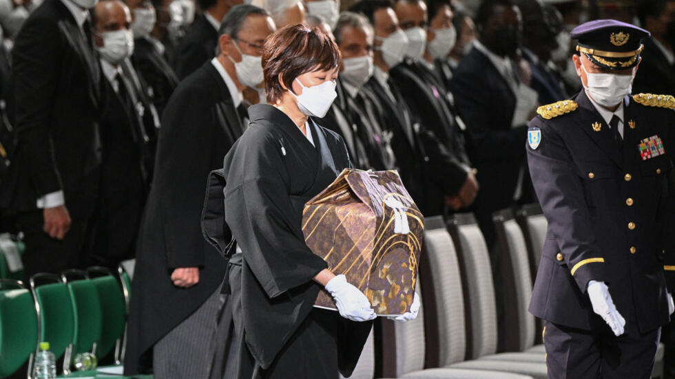 Japan honours assassinated ex-PM Abe at controversial state funeral