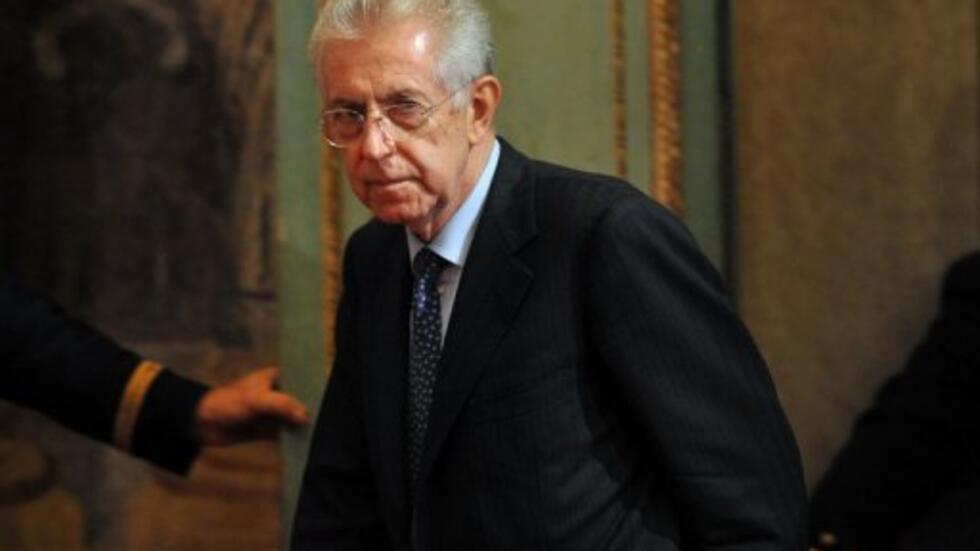PM Monti unveils cabinet, will serve as economy minister