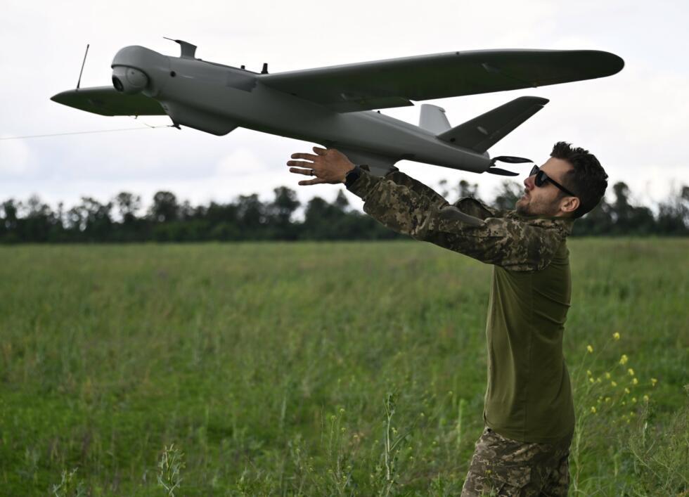 Ukrainians fly locally-made drones to sharpen artillery aim