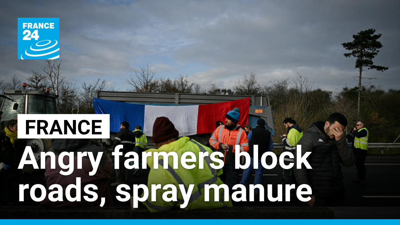 Angry French farmers block roads, spray manure at public building ...