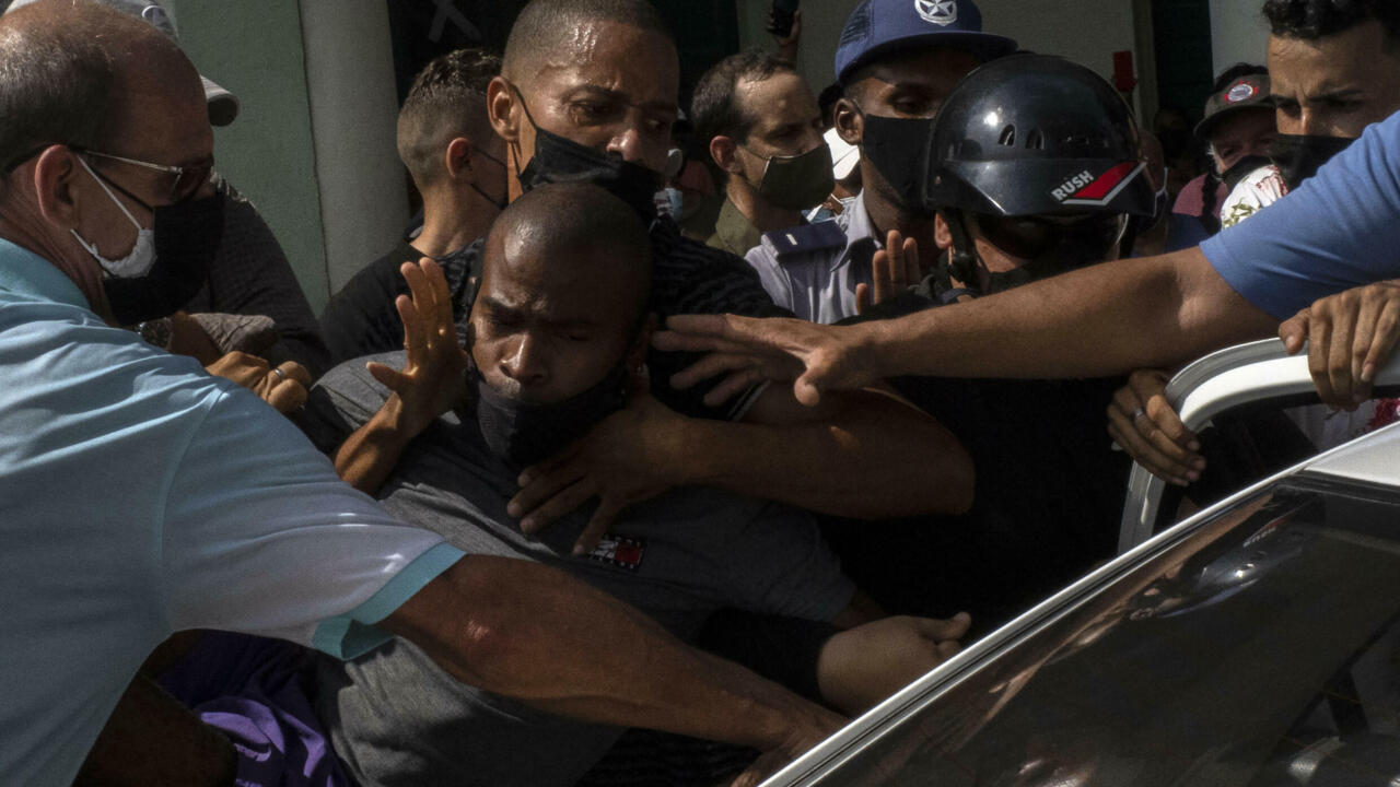 One dead, more than 100 arrested after anti-government protests in Cuba