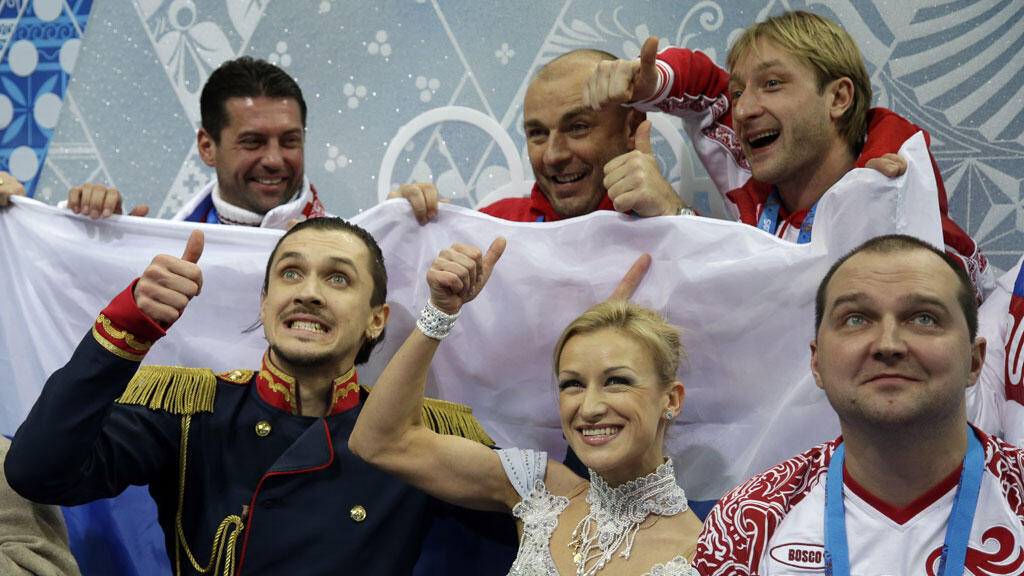 Russia wins first gold on day two of Sochi Olympics