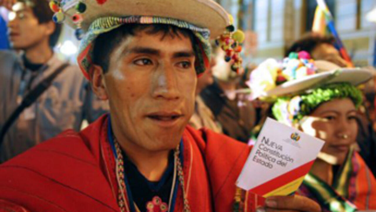 Bolivia votes on new charter in divisive referendum