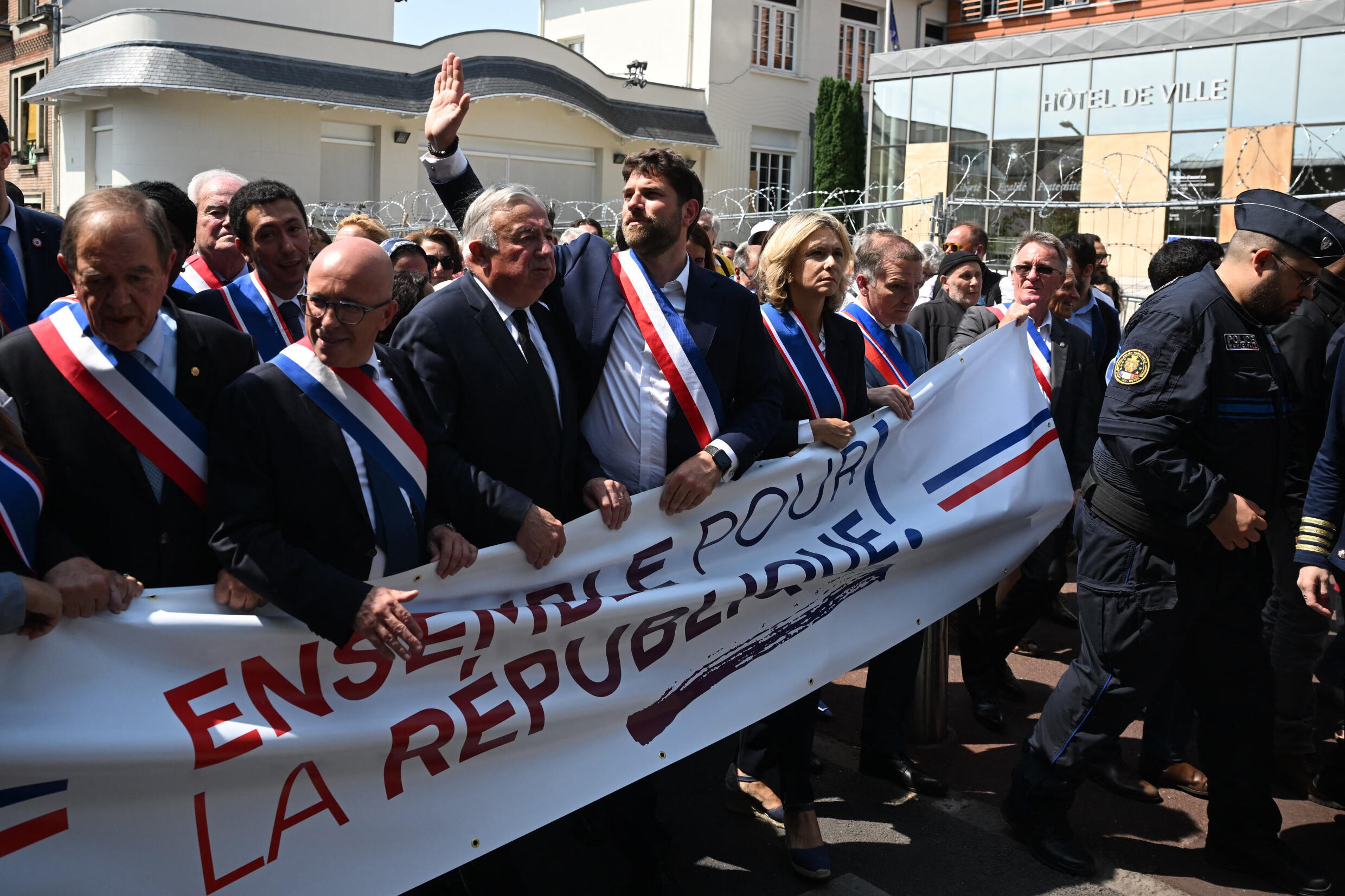 Crowds gather at town halls across France in show of solidarity after ...