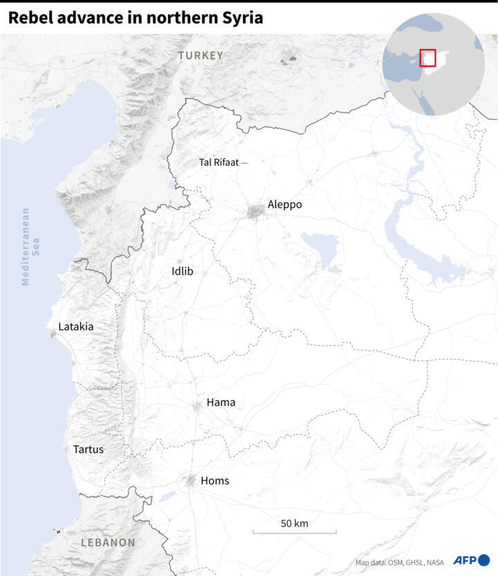 Syria rebels 'at gates' of central city Hama