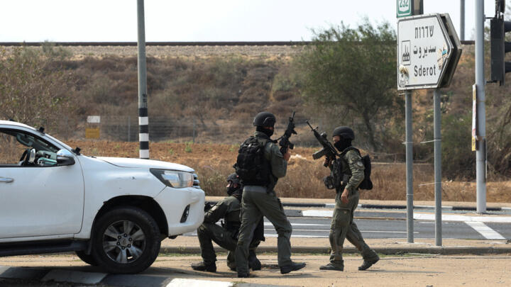 More than 700 Israelis killed, more than 100 held 'prisoner' in war ...