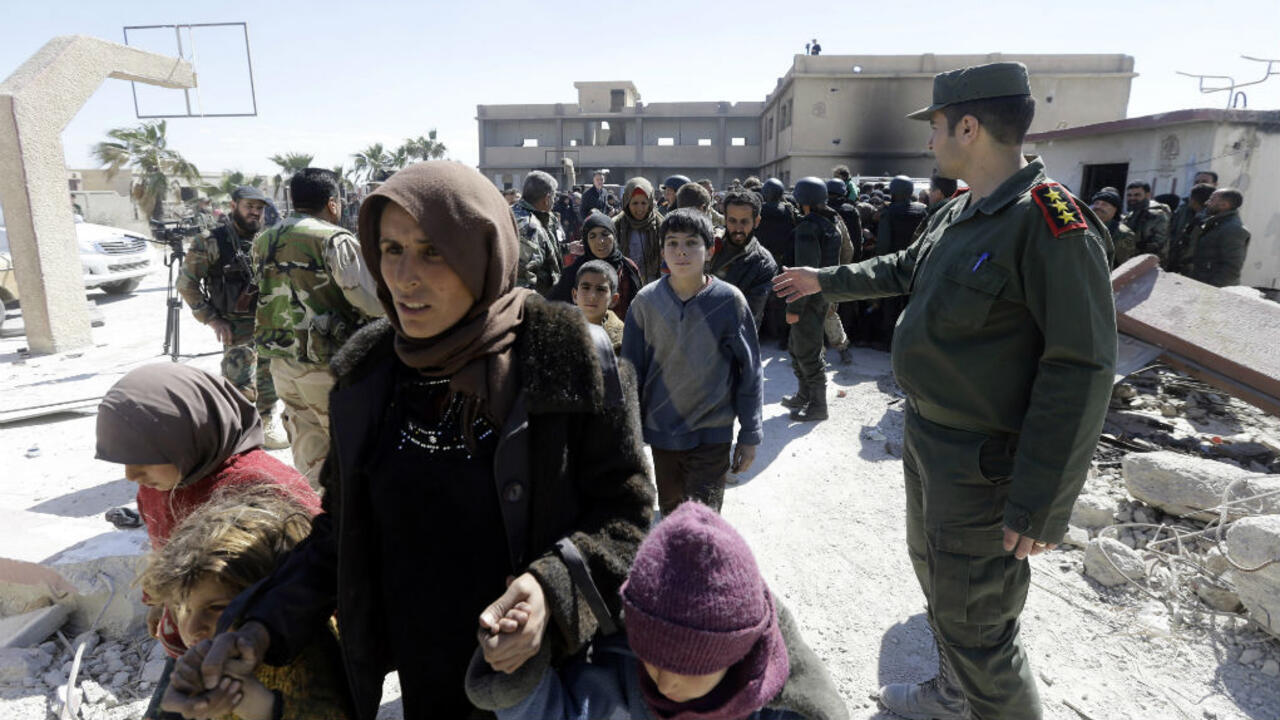 Civilians flee as two big Syria battles enter decisive phases