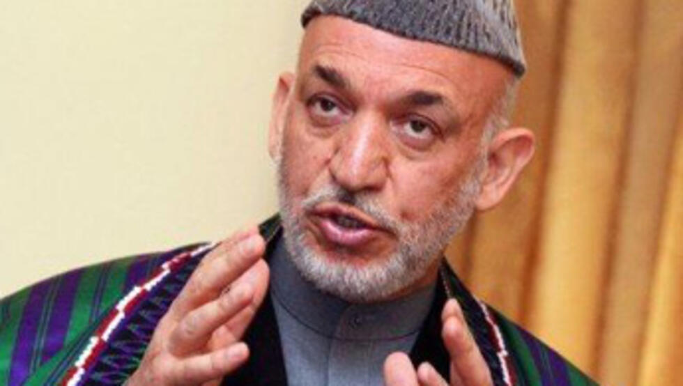 Karzai presents new cabinet in attempt to please both warlords and West