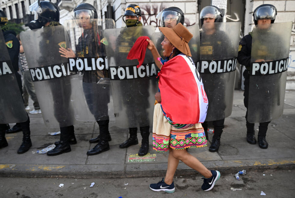 Protesters brave tear gas to demand ouster of Peru's embattled leader