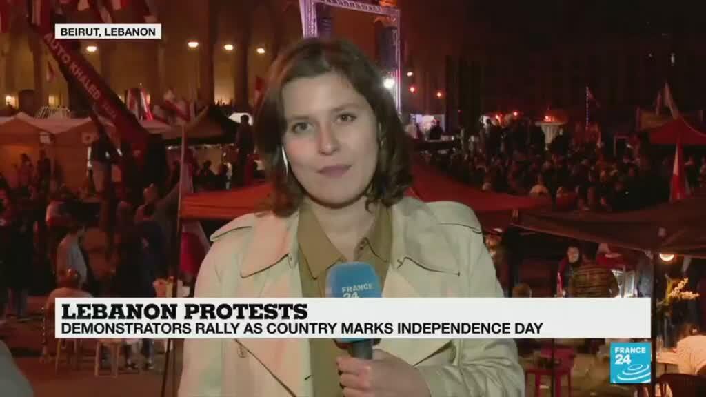 Lebanon's protesters, leaders hold parallel national day rallies