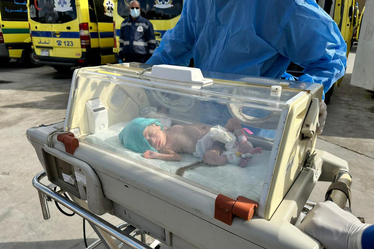 Gaza babies evacuated to Egypt as Hamas reports deadly hospital strike