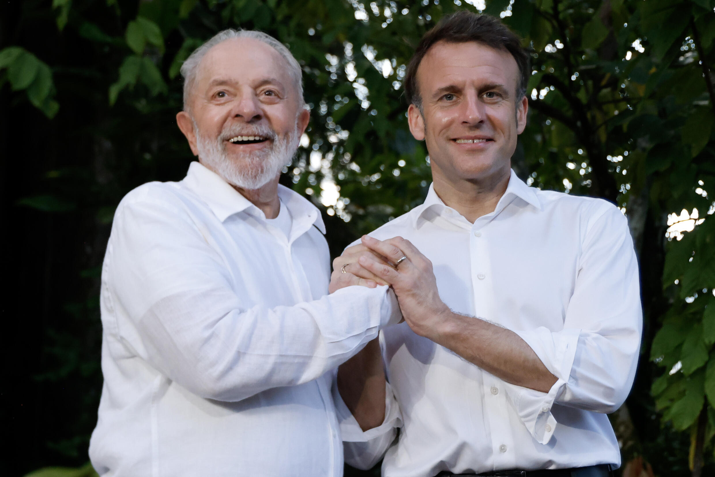 Macron quips about cuddly 'wedding' pics with Lula