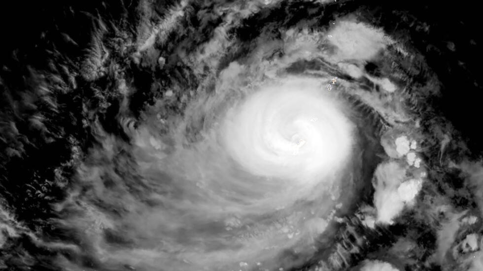 Guam 'weathers storm' as Typhoon Mawar moves west