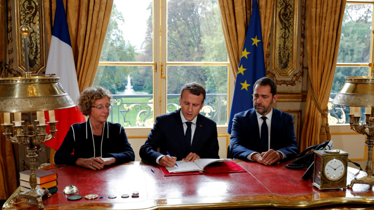 Macron signs sweeping labour reforms into law