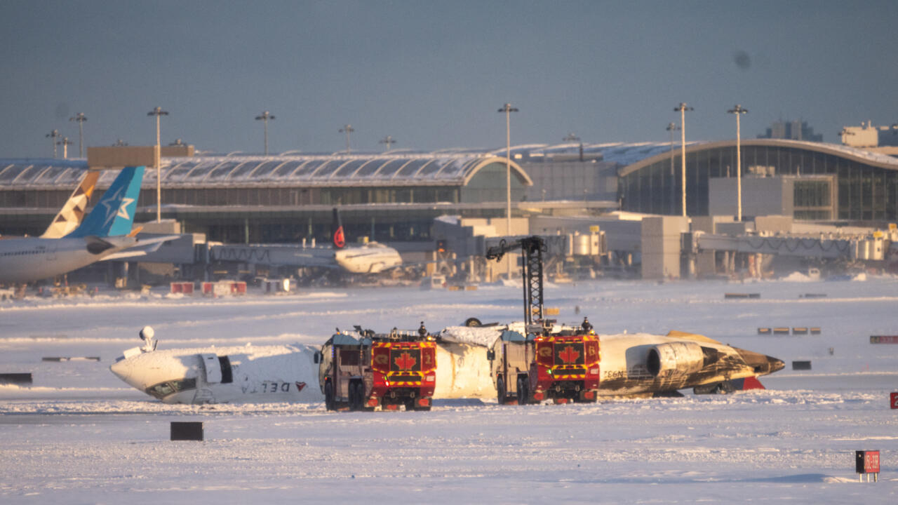 Plane flips on landing at Toronto airport, all 80 aboard survive