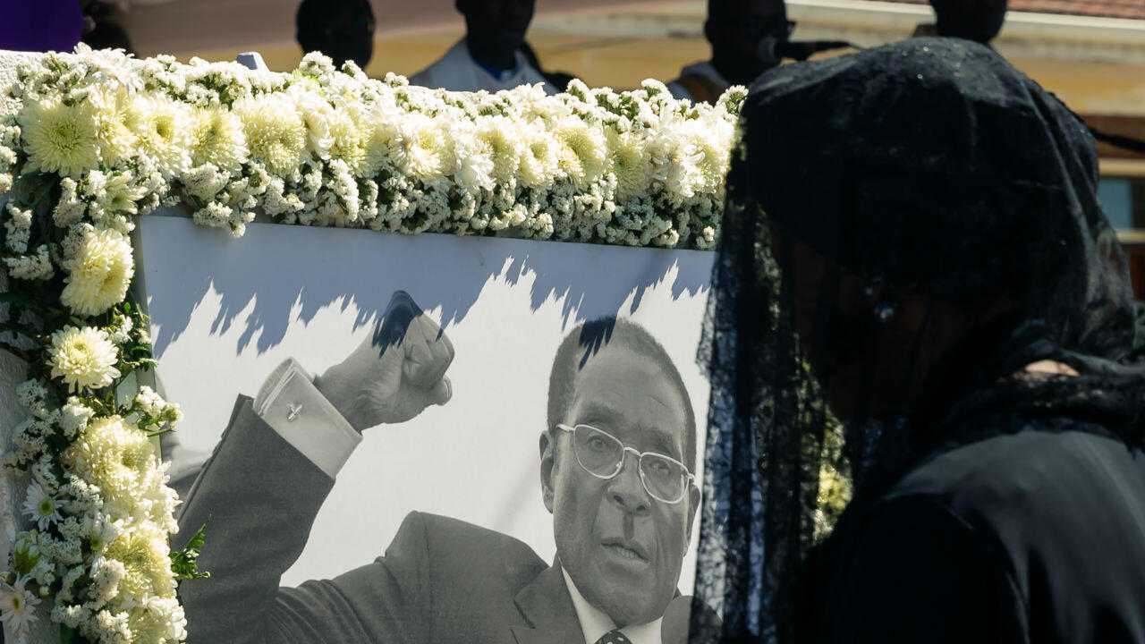 'This man lives forever': Zimbabwe's Robert Mugabe buried in private ...