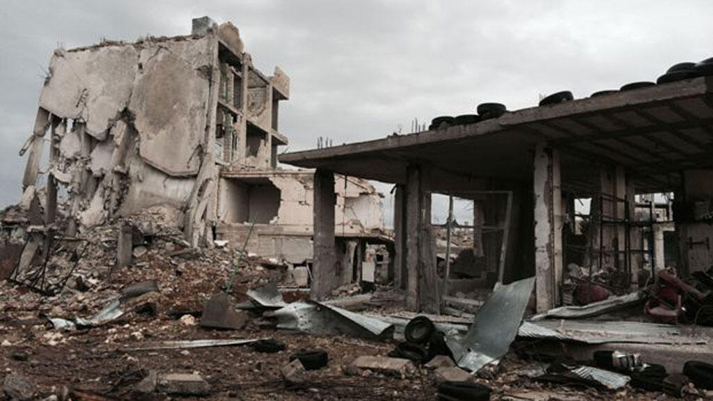 Kurdish fighters celebrate victory in shattered Kobane