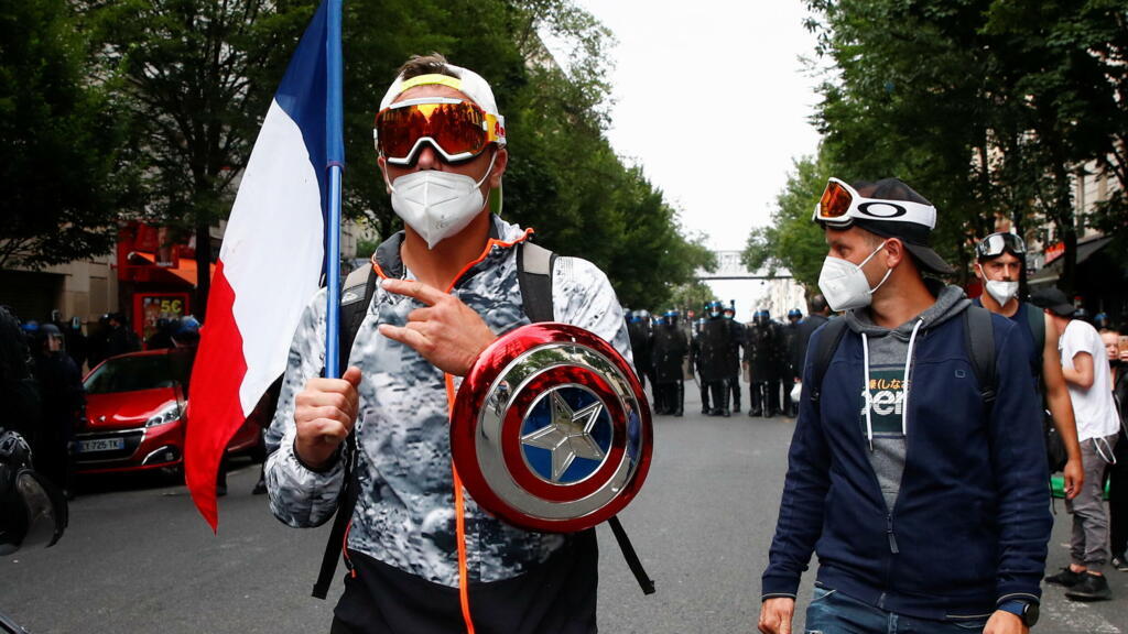 French protesters clash with police on Bastille Day amid anger over ...