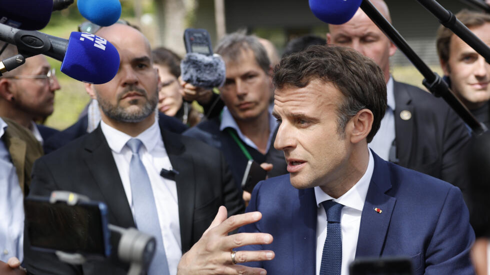 'We're exhausted': Macron faces angry voters as he campaigns against Le Pen