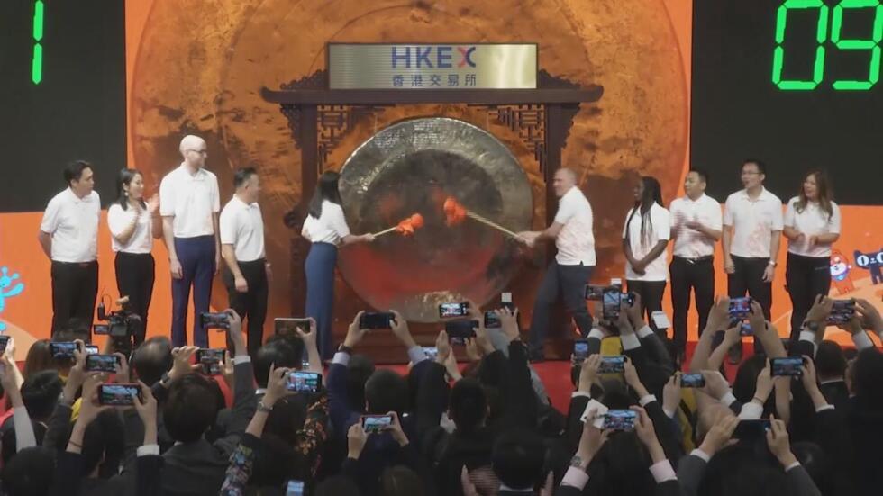 Alibaba stock jumps in Hong Kong trading debut - Business