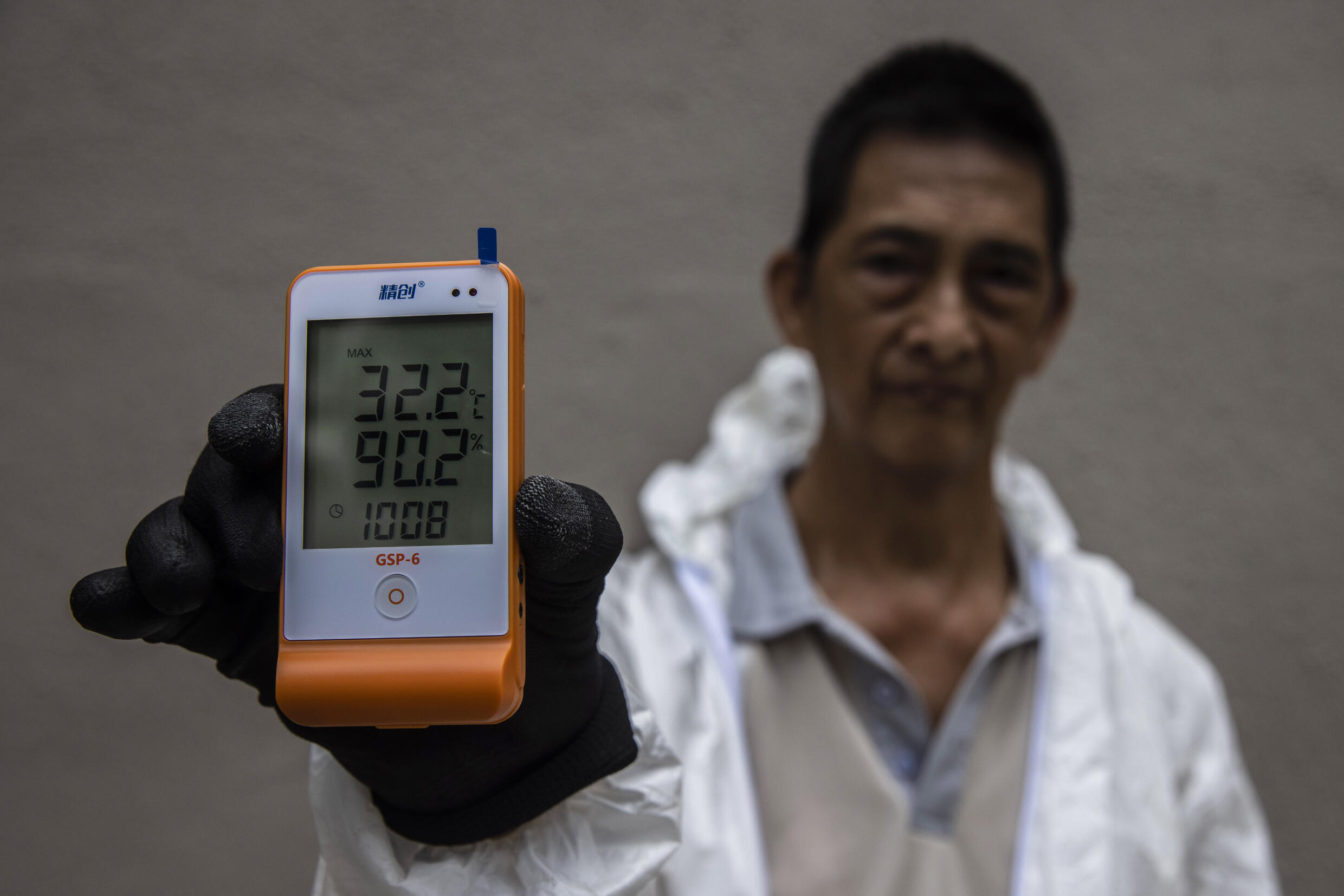 'In a sauna': Hong Kong's labourers swelter as temperatures rise
