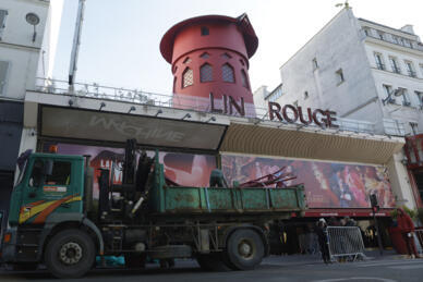 Paris landmark Moulin Rouge's windmill sails collapse