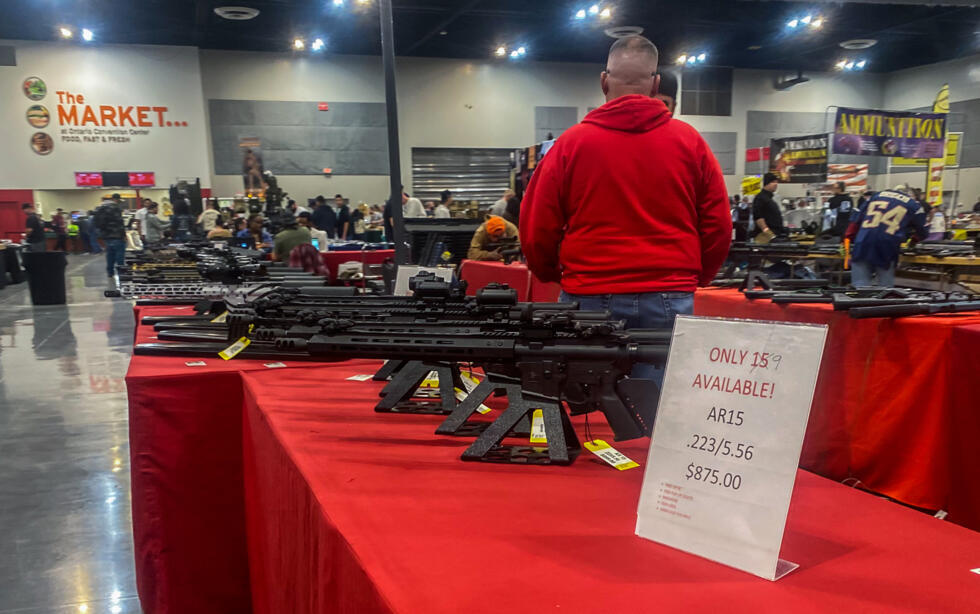 At California gun fair, few speak of recent massacres