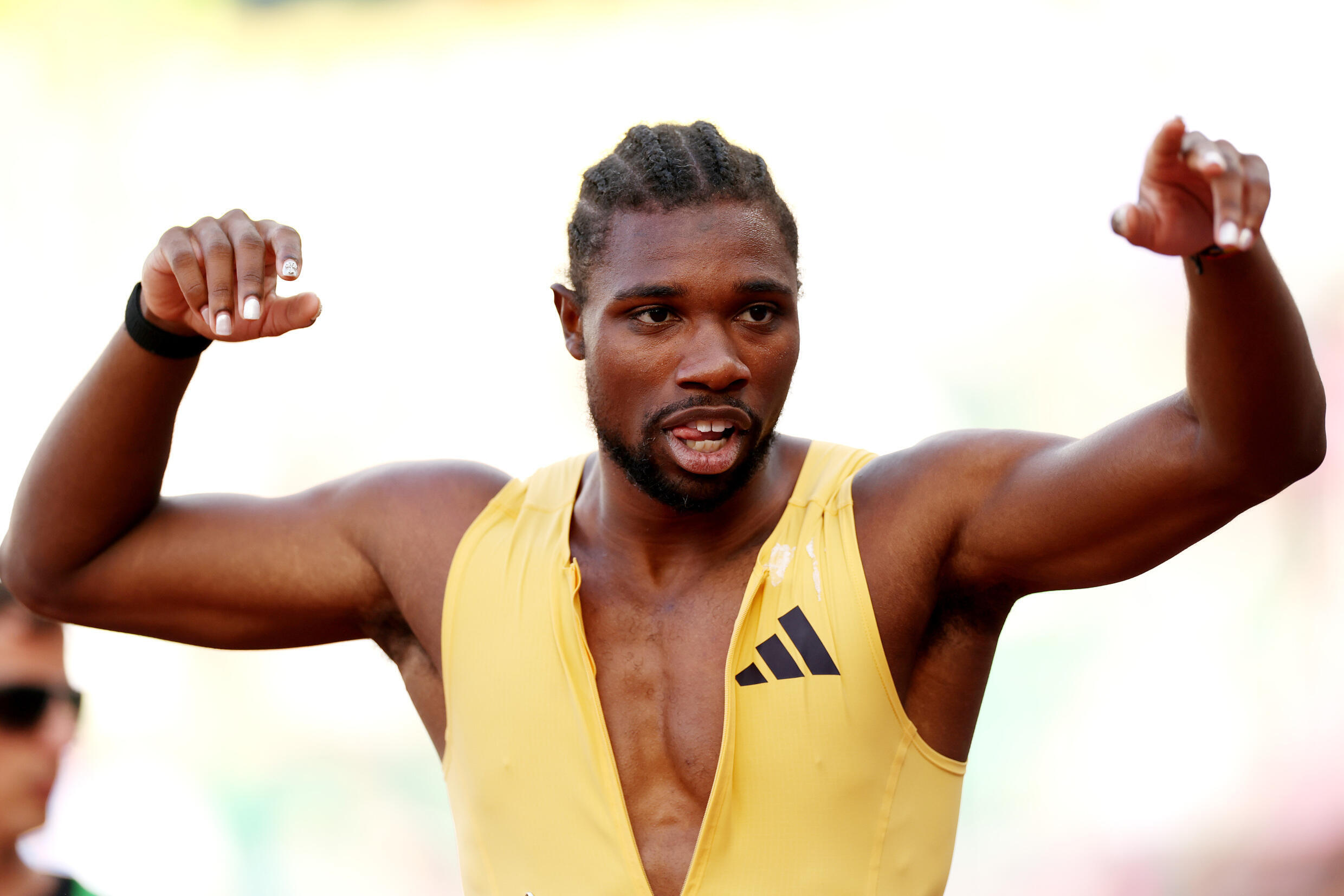 Richardson Olympic double bid over as Lyles marches on