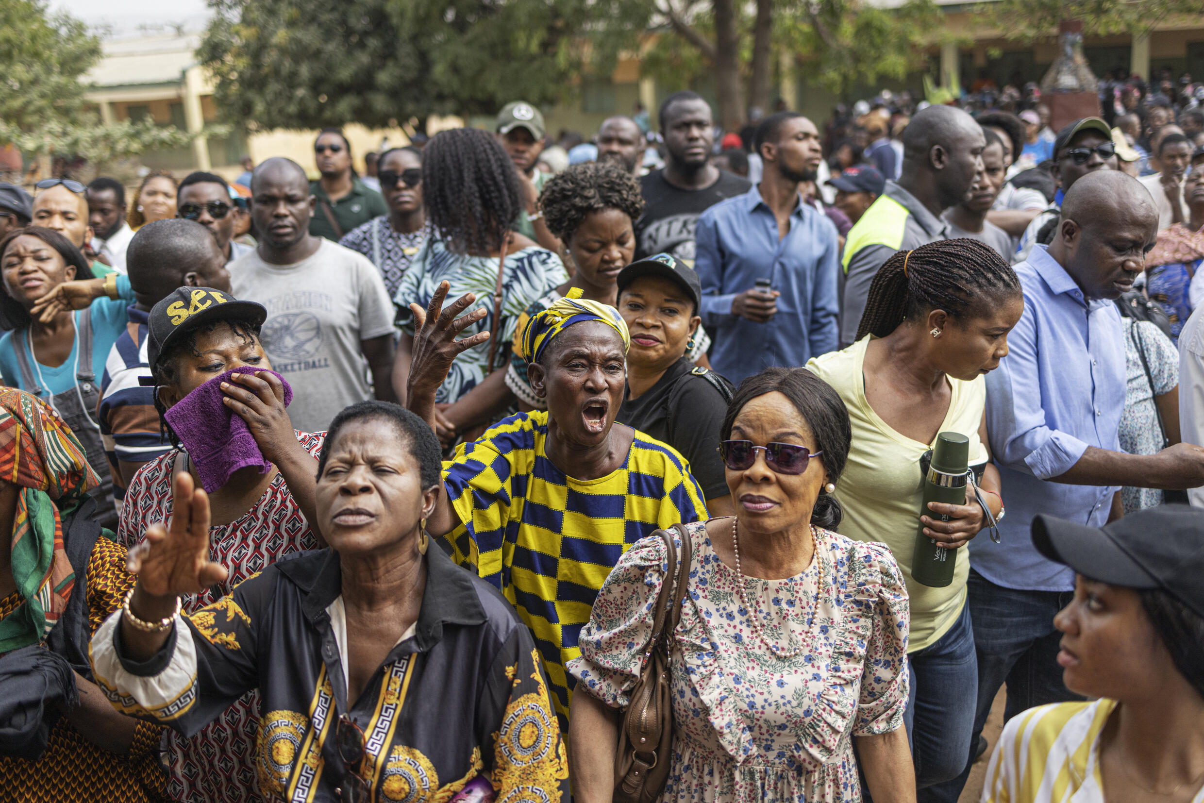 Nigerians vote for new president in tight election hit by delays