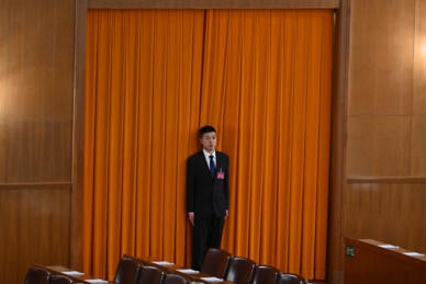 China's elite don traditional garb for annual 'Two Sessions' talking shop