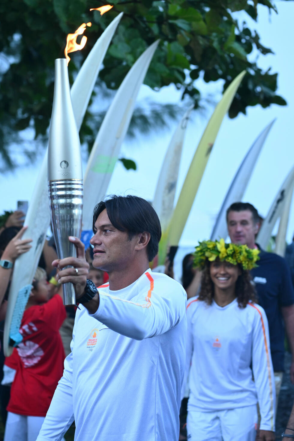 Olympic torch odyssey reaches the surf of Tahiti
