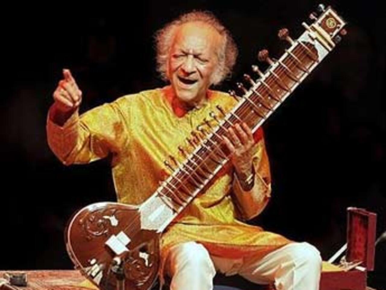 George Harrison Playing Sitar