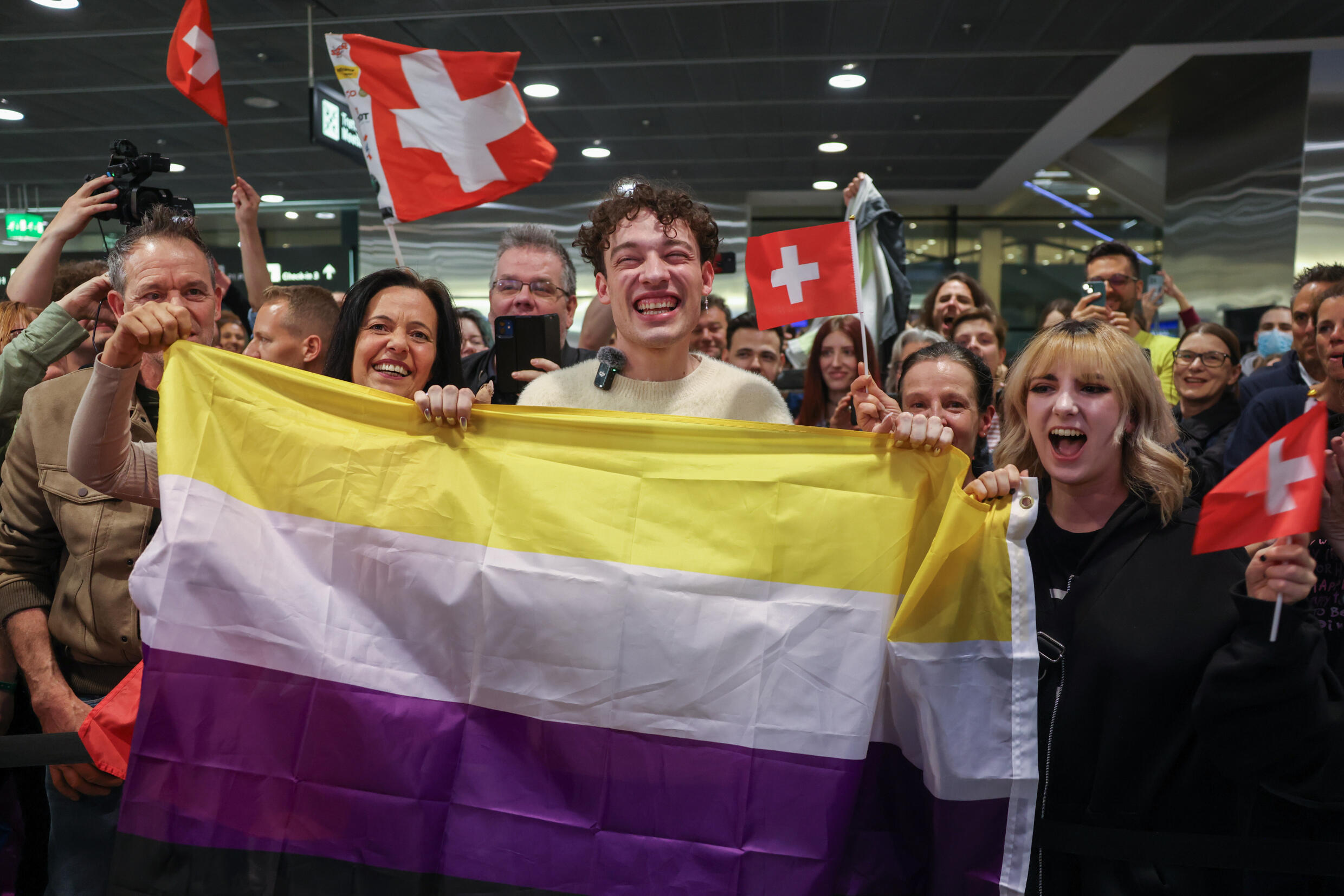Swiss Eurovision winner Nemo returns to hero's welcome