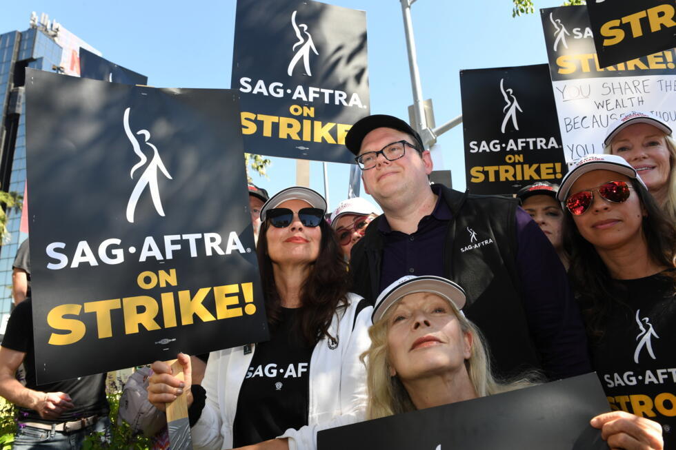 Striking actors join picket lines as Hollywood shuts down