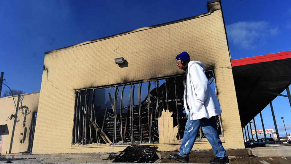 Ferguson braces for further unrest after night of violence