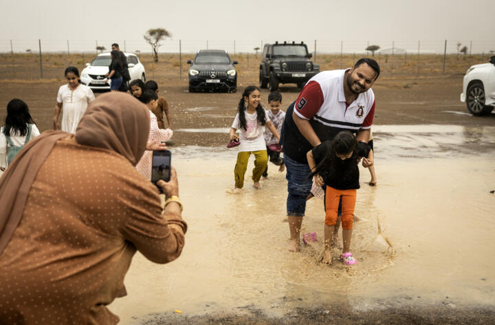 Monsoon-loving Indian expats chase rain in UAE desert