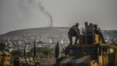 Syrian Kurdish fighters plead for help in battle for Kobane