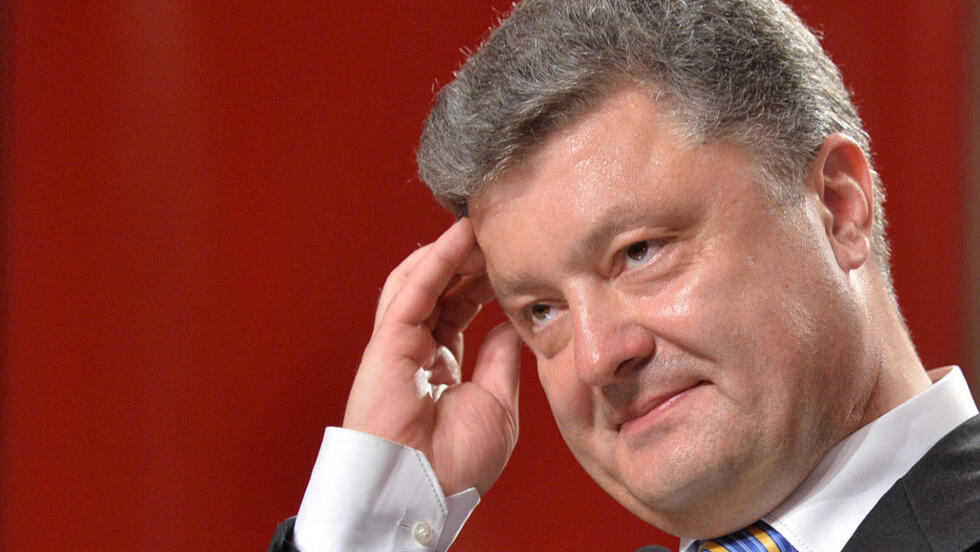 France invites Ukraine's Poroshenko to join Putin to mark D-Day