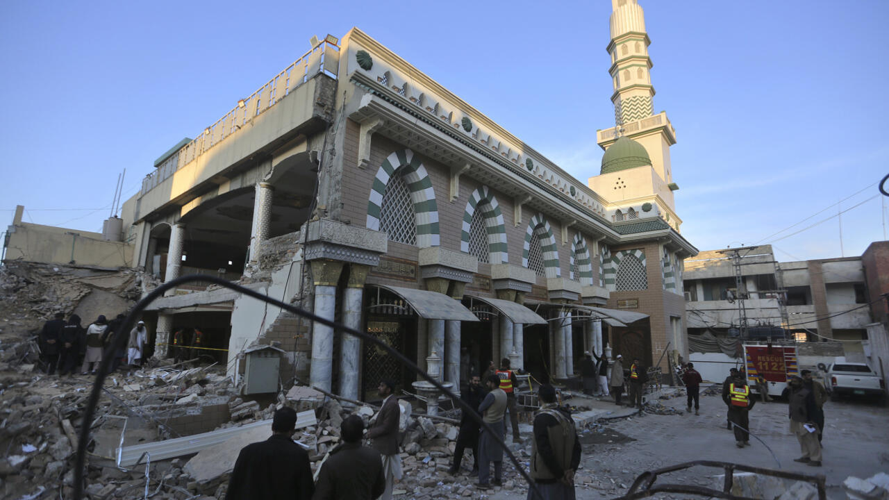 Pakistan blames 'security lapse' for mosque bombing as death toll ...